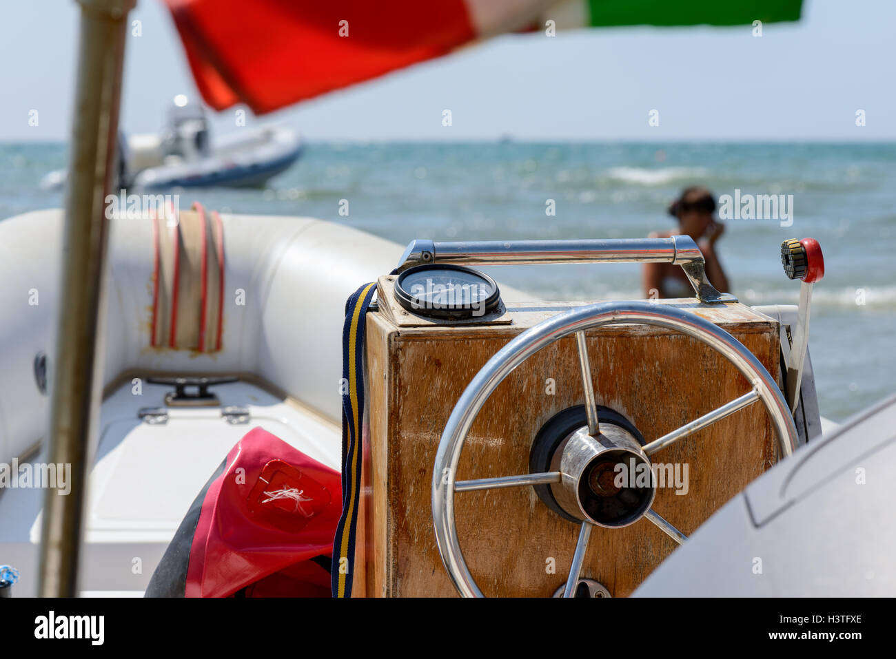 nice fish boat with rudder in the sea Stock Photo - Alamy