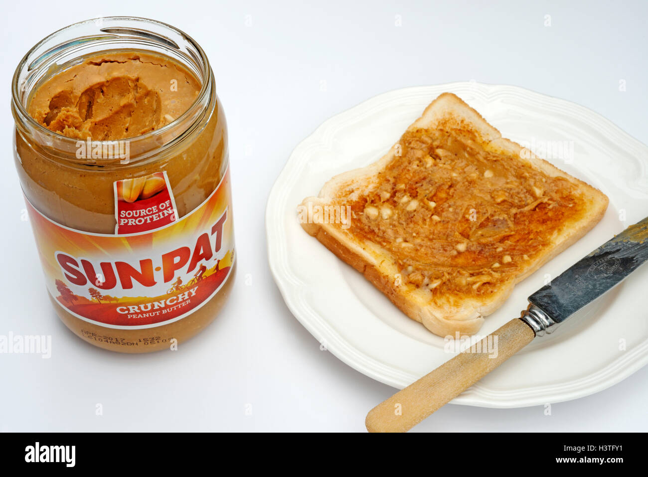 Sun-Pat crunchy peanut butter on toast Stock Photo - Alamy