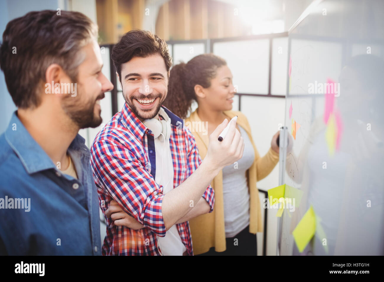 Businessman writing whiteboard conference room hi-res stock photography ...