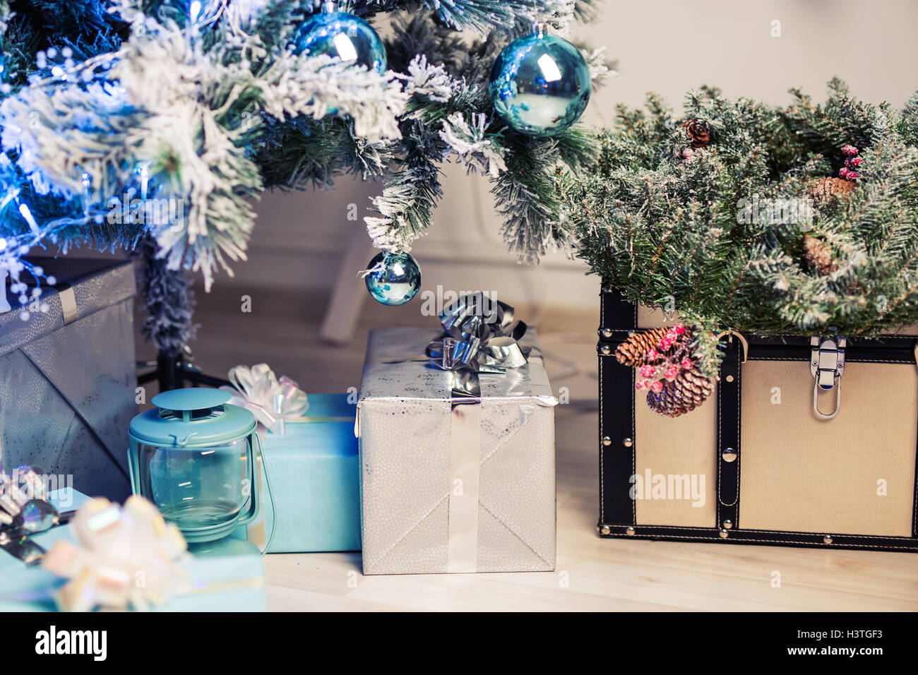 Close up decorated fir tree and gift boxes Stock Photo - Alamy