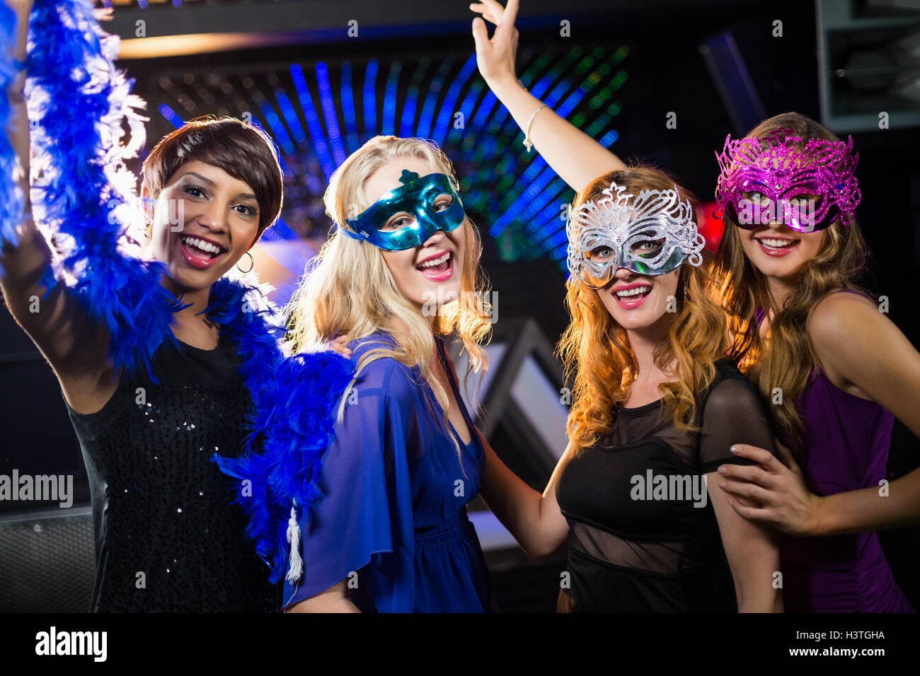 Group of smiling friends dancing on dance floor Stock Photo - Alamy