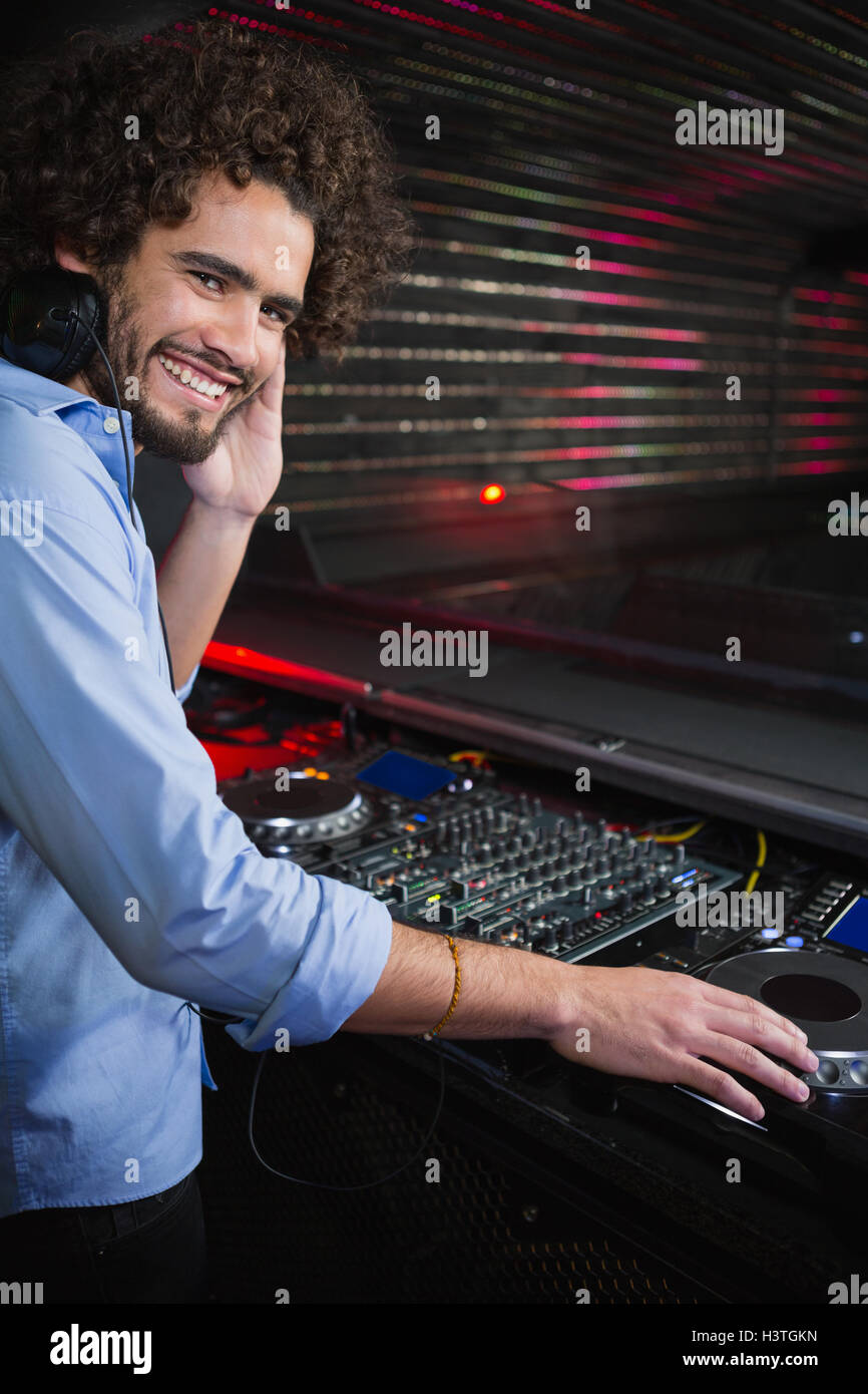 Male DJ playing music Stock Photo - Alamy