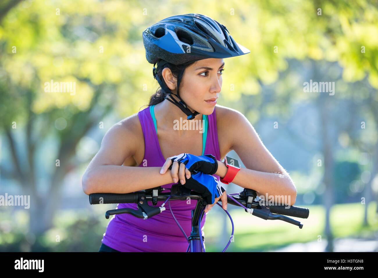 Leaning on bicycle hi-res stock photography and images - Alamy