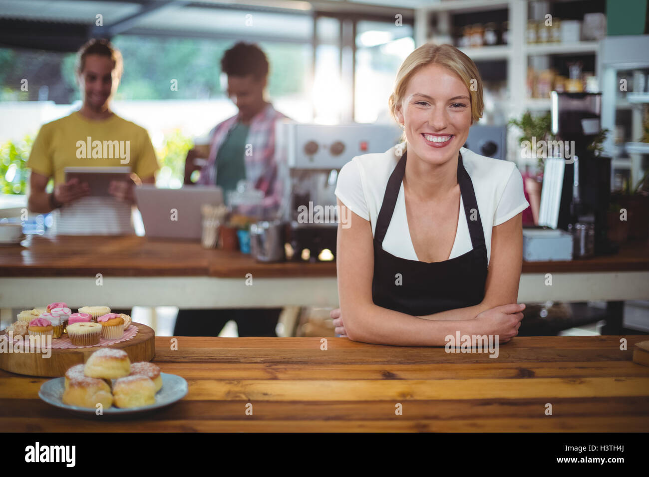 Portrait waitress behind counter hi-res stock photography and images ...