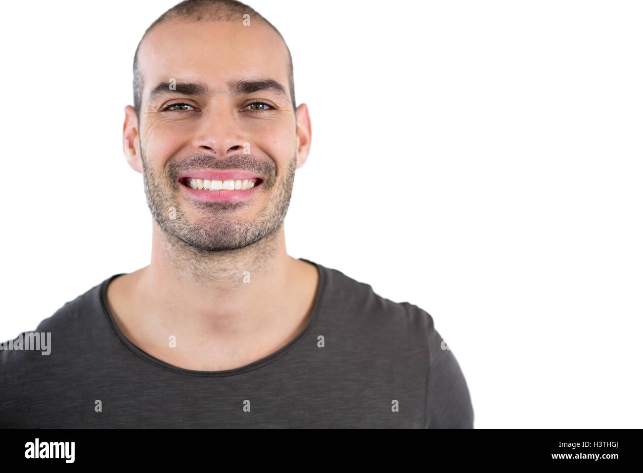 Man smiling against white background Stock Photo - Alamy