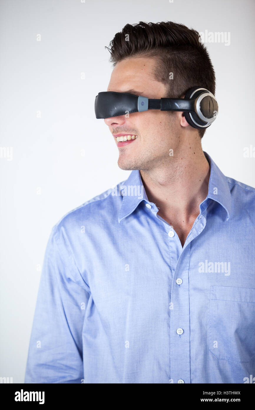 Man using virtual video glasses Stock Photo - Alamy