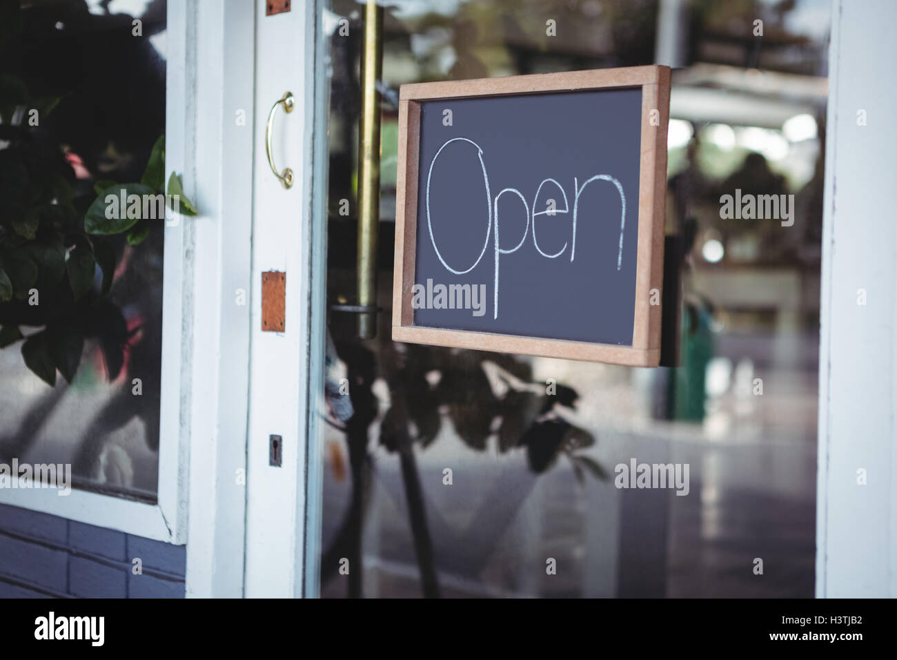 Open signboard on the door Stock Photo - Alamy