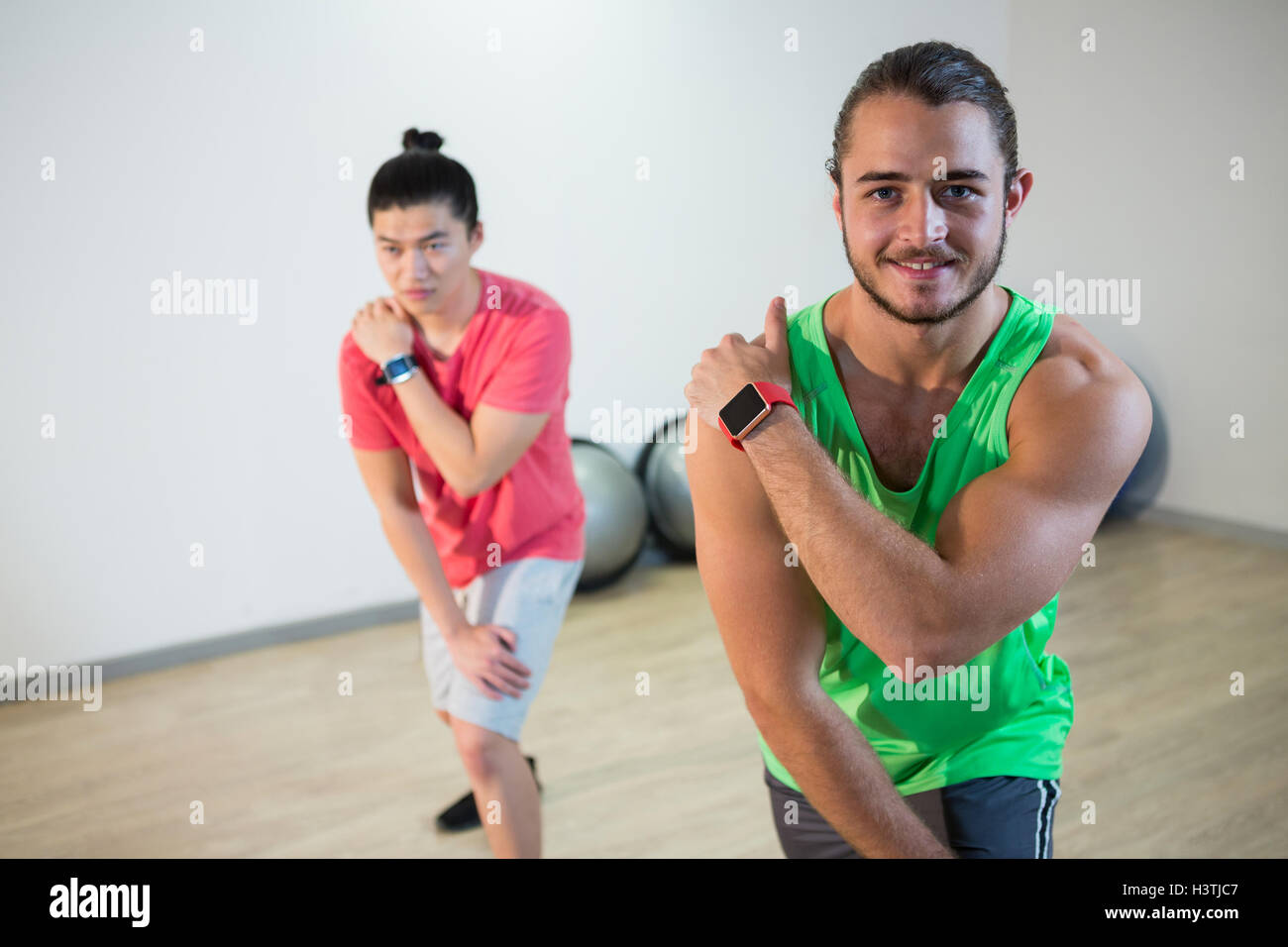 Handsome men exercising in gym hi-res stock photography and images - Alamy