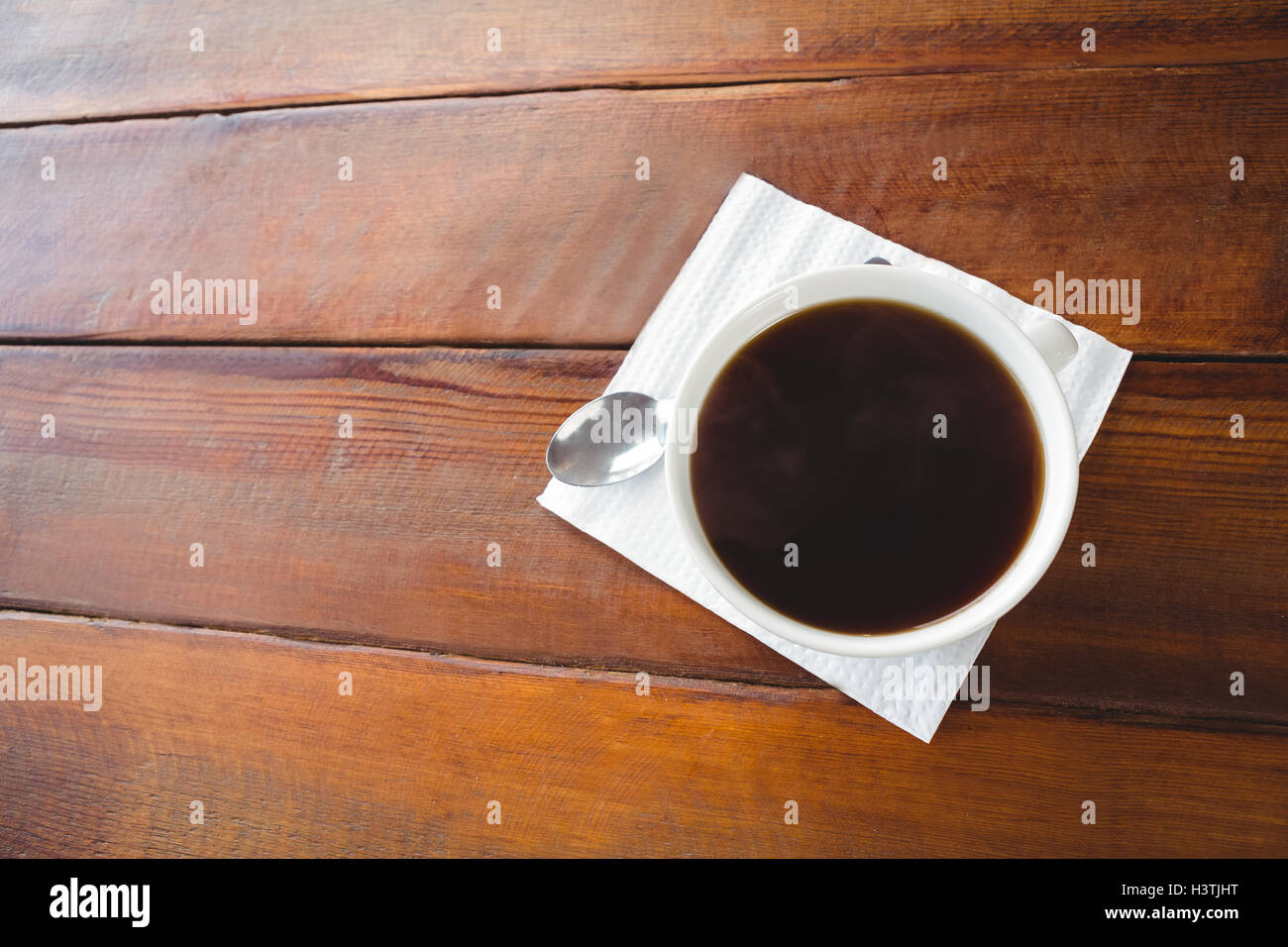 Black coffee on a tissue paper Stock Photo - Alamy