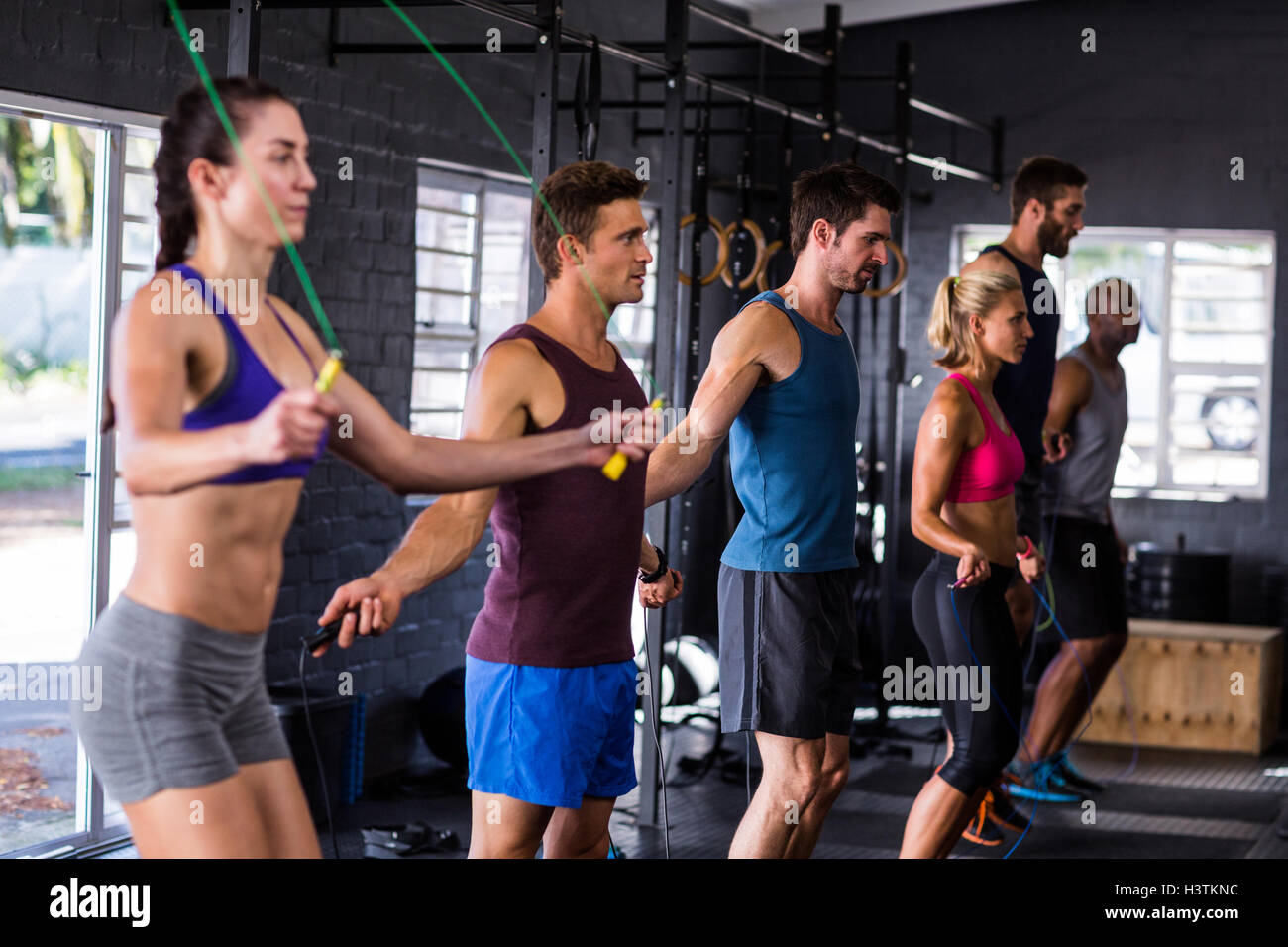 People skipping in gym Stock Photo - Alamy