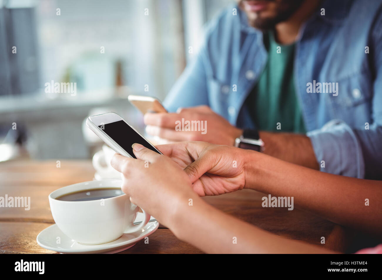 Mobile hands together hi-res stock photography and images - Alamy
