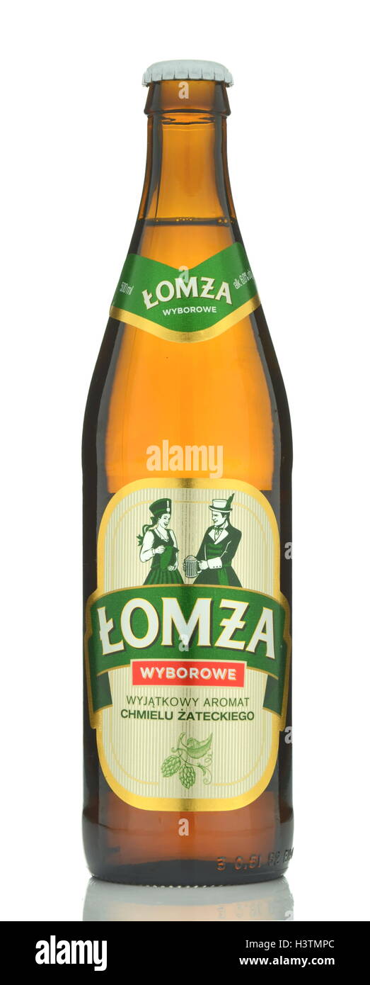 Lomza unpasteurized lager beer isolated on white background. Lomza ...
