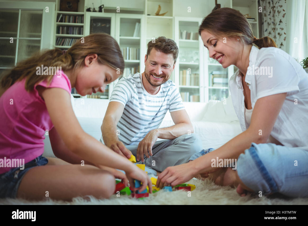 Father daughter playing toy blocks hi-res stock photography and images ...