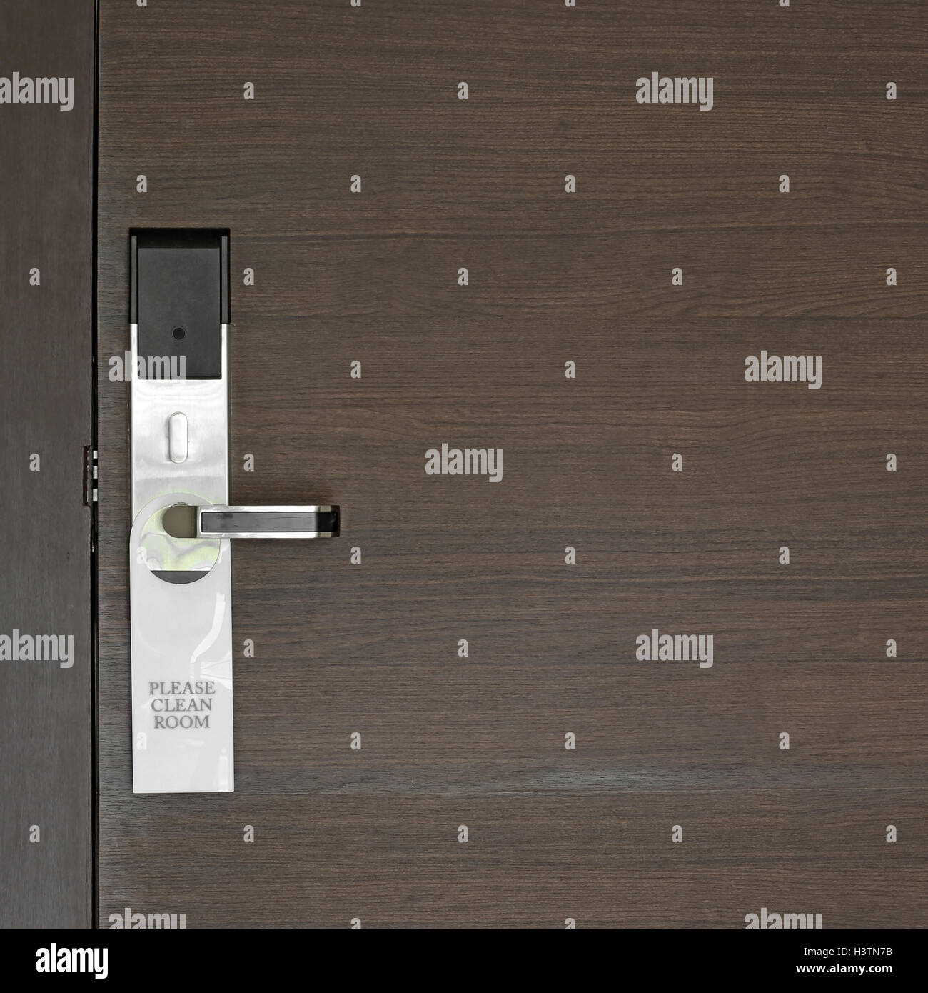 hotel electronic card lock with please clean room sign Stock Photo - Alamy