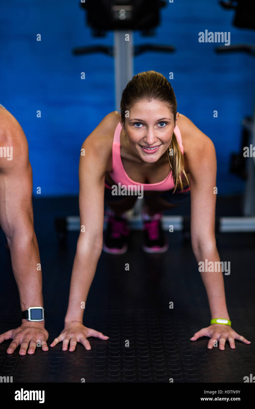 Young female athlete doing push-ups Stock Photo - Alamy