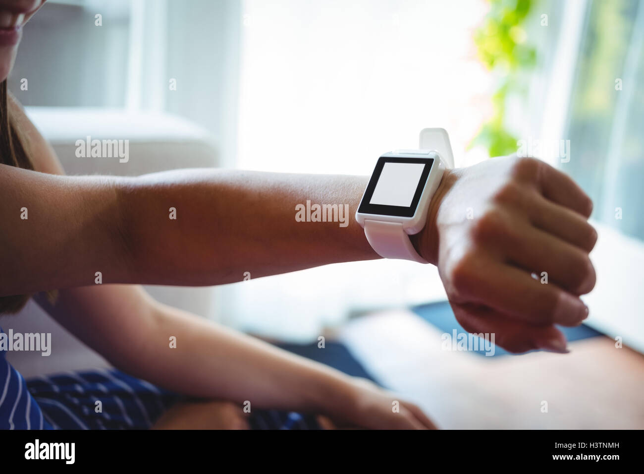 Hand wearing smart watch hi-res stock photography and images - Alamy