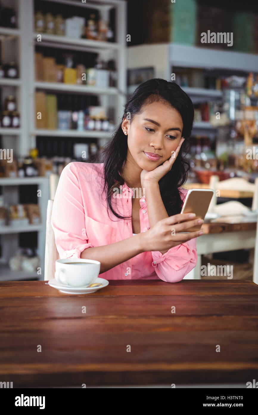 Beautiful woman using mobile phone Stock Photo - Alamy