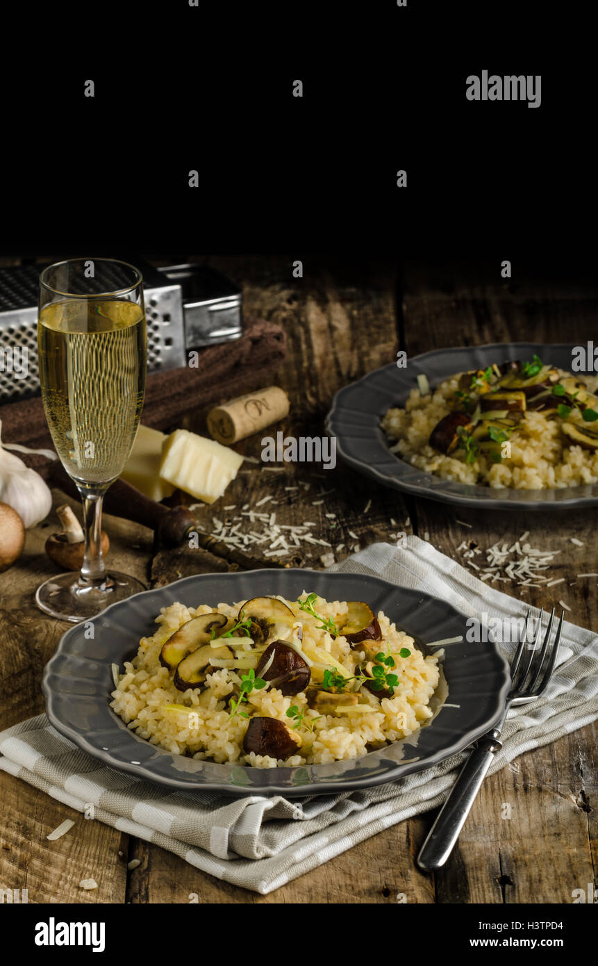 Original italian risotto with mushrooms and parmesan cheese Stock Photo ...