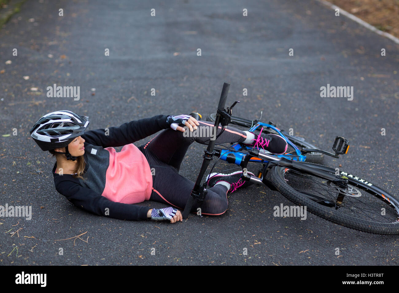 Cyclist fallen from bike hi-res stock photography and images - Alamy