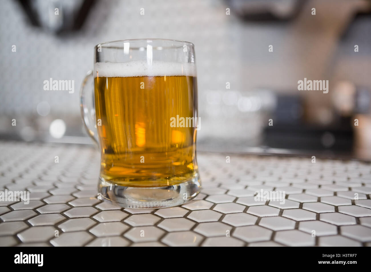 Glass of beer on bar hi-res stock photography and images - Alamy