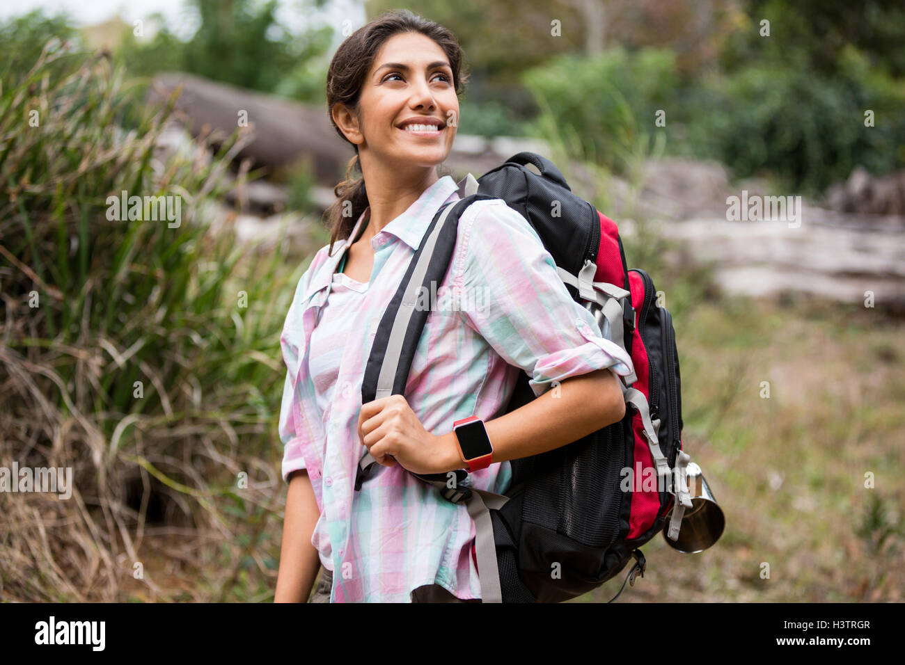 Female hiker hiking in forest Stock Photo - Alamy