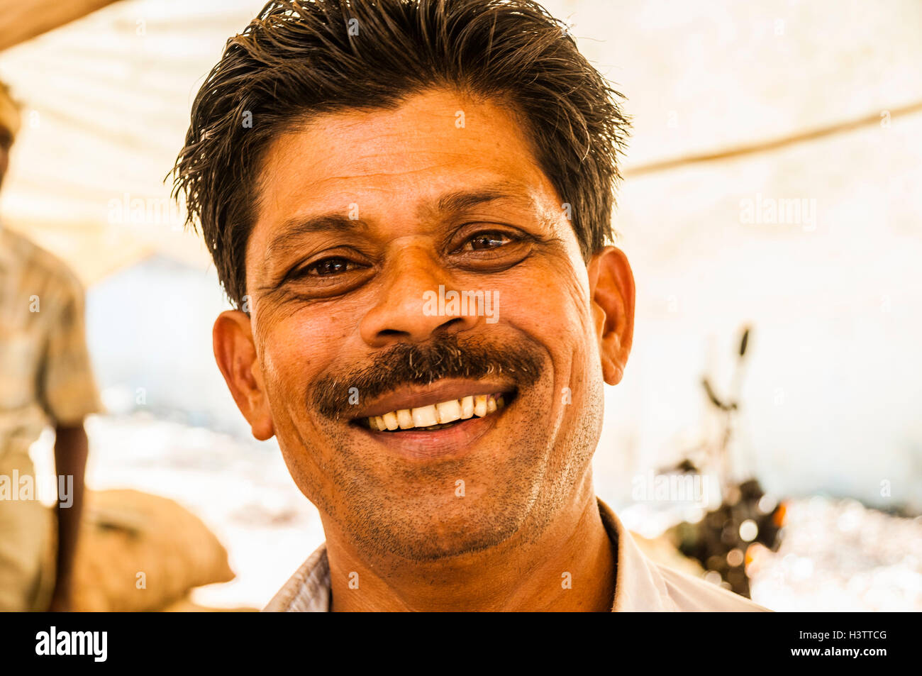 South indian man laughing hi-res stock photography and images - Alamy