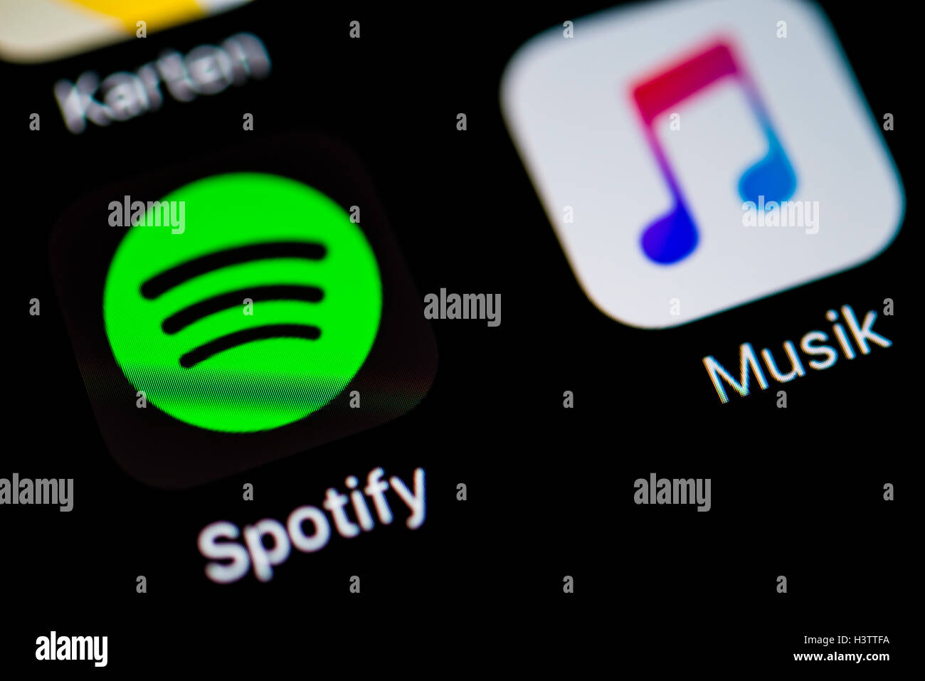 Smartphone screen with Music and Spotify app icons in detail Stock ...