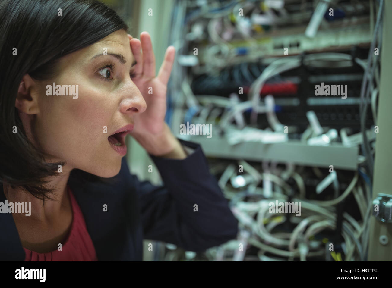 Technician getting stressed over server maintenance Stock Photo - Alamy