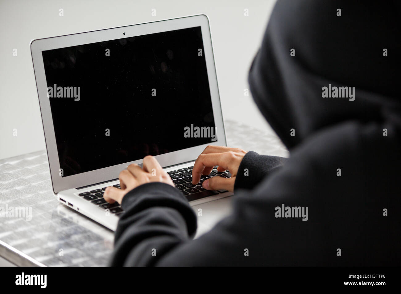 Female computer hacker sitting laptop hi-res stock photography and ...