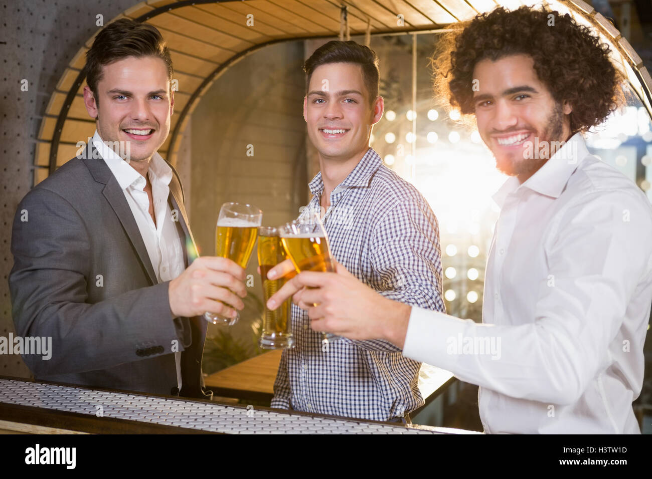 Group friends toasting glass hi-res stock photography and images - Alamy