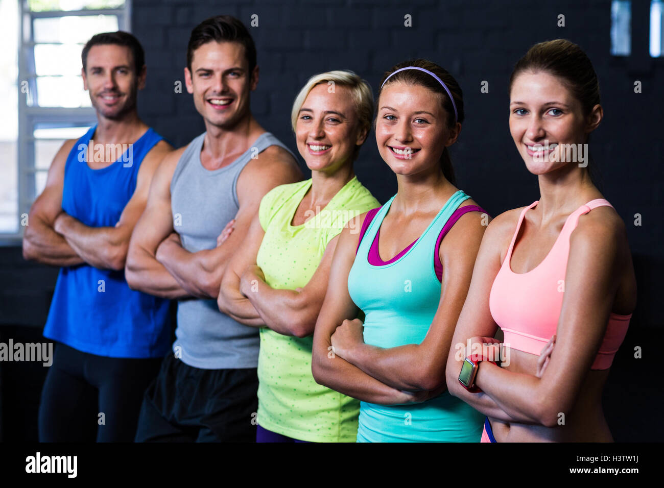 Confident athletes in gym Stock Photo - Alamy