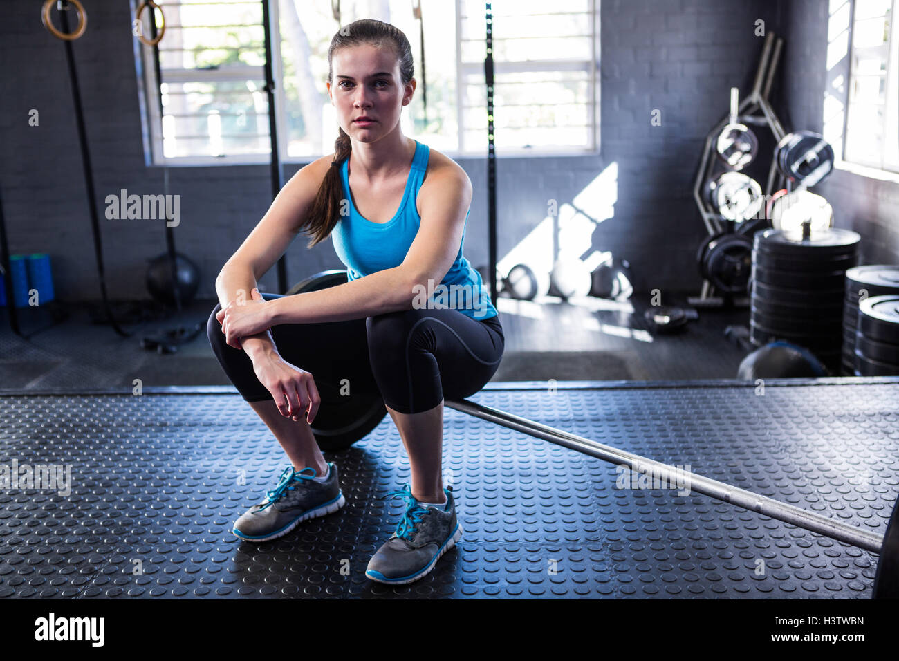 Athlete sitting on barbell hi-res stock photography and images - Alamy