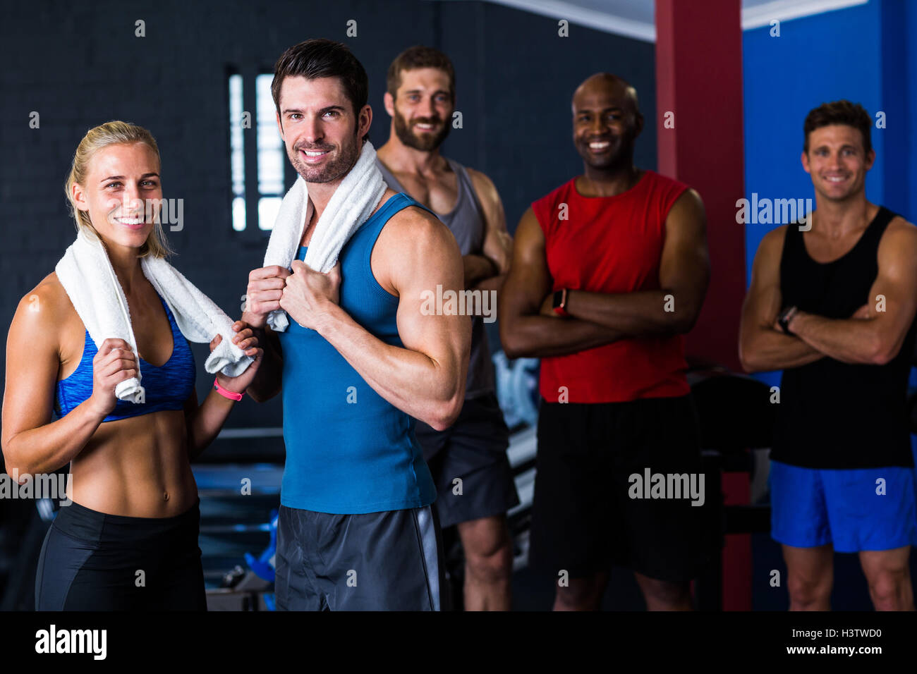 Portrait of happy multi-ethnic friends in gym Stock Photo - Alamy