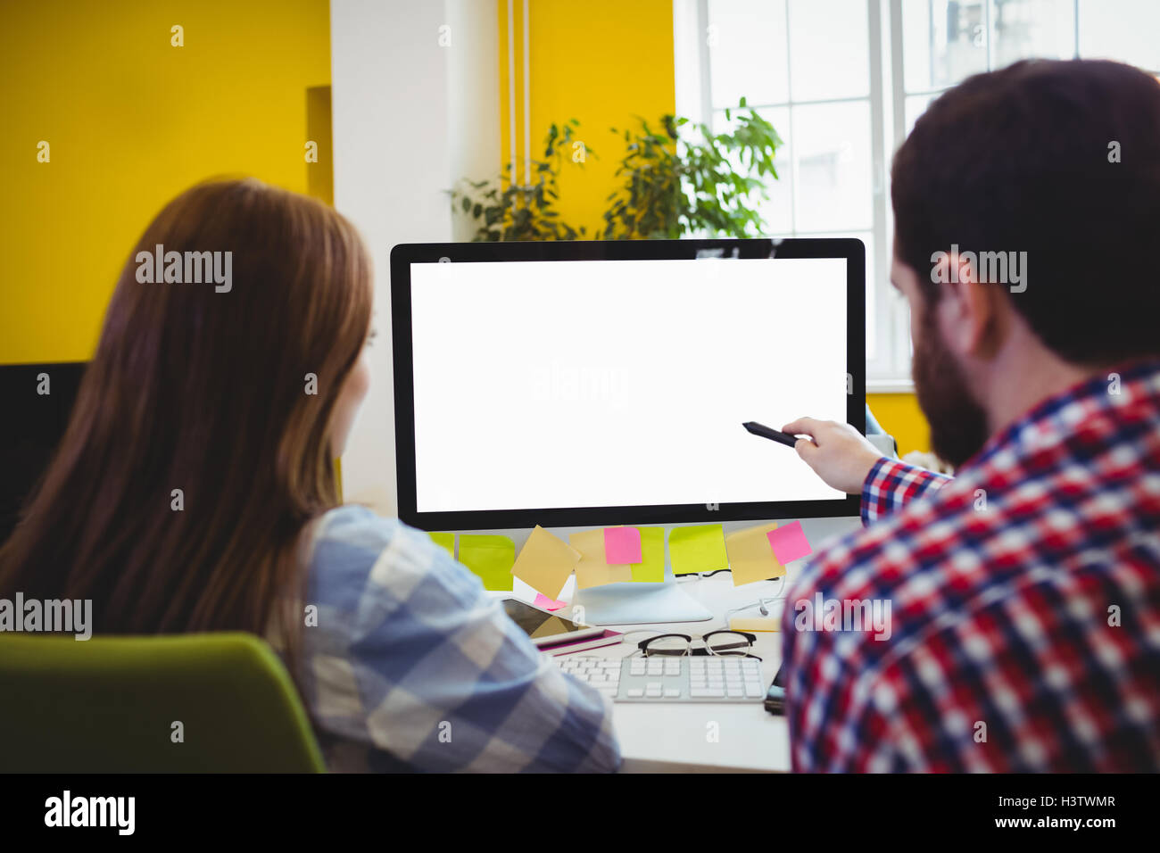 Young girl computer rear view hi-res stock photography and images - Alamy