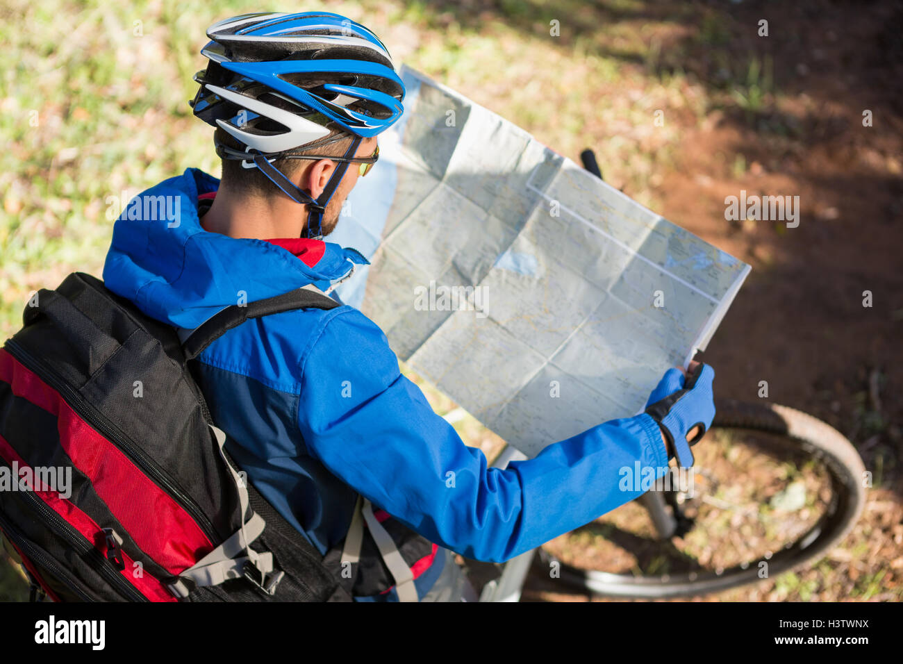 Mountain Biker Holding Map High Resolution Stock Photography and Images ...