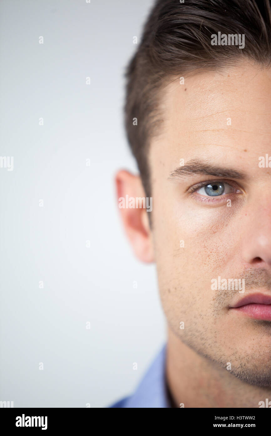 Man wearing contact lens Stock Photo - Alamy