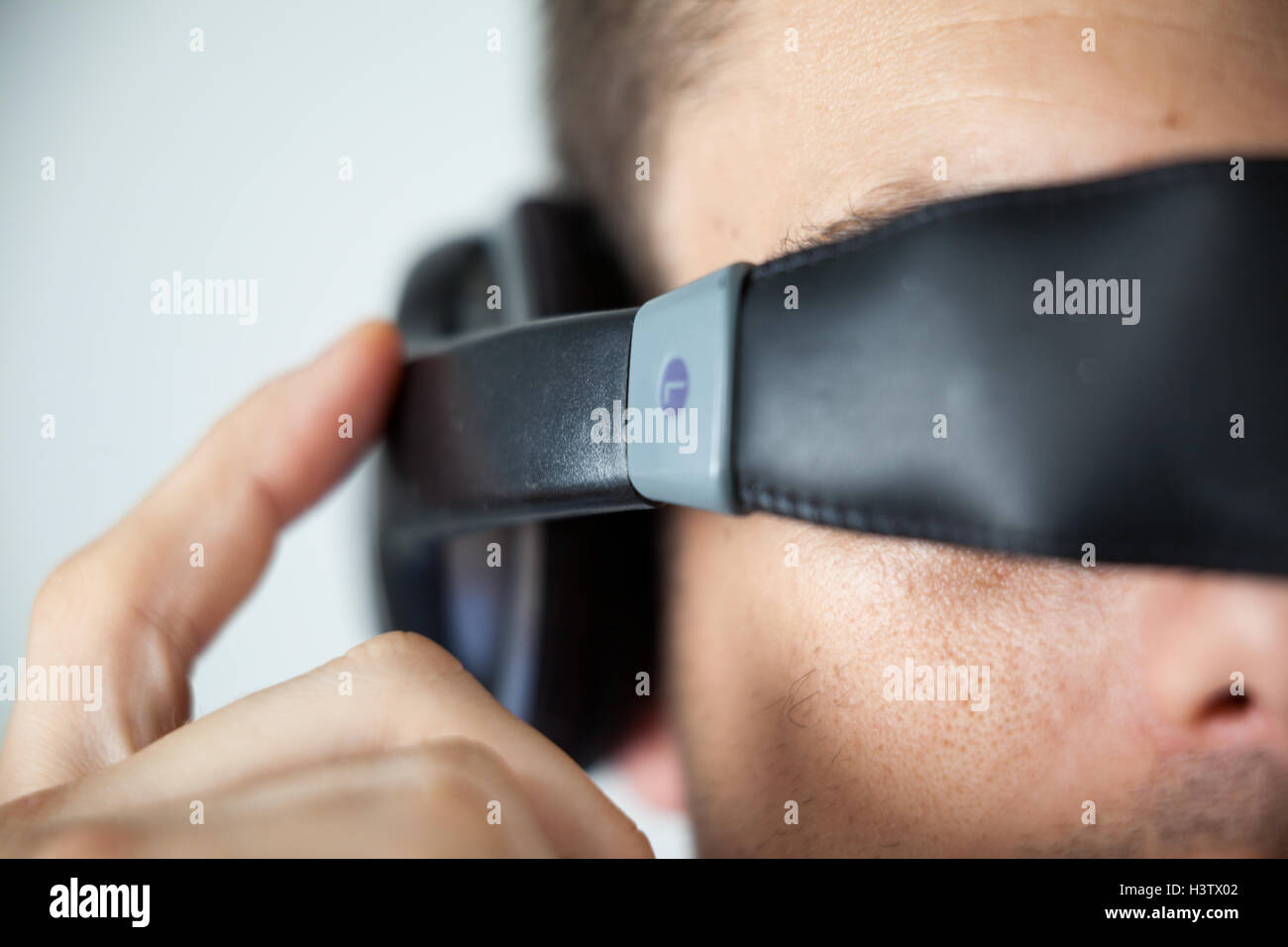 Man wearing virtual video glasses Stock Photo - Alamy