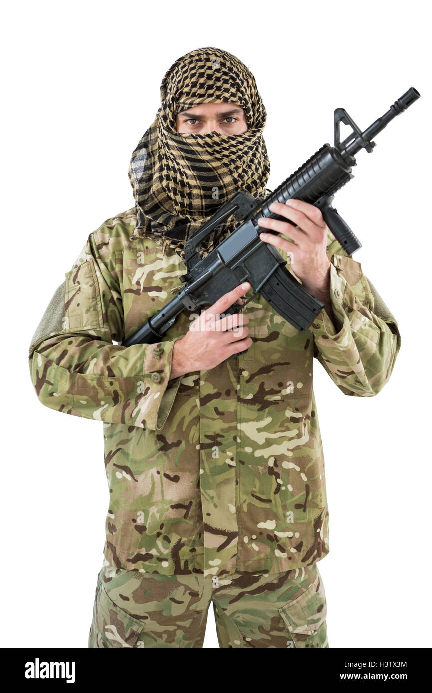 Portrait of soldier holding a rifle Stock Photo - Alamy