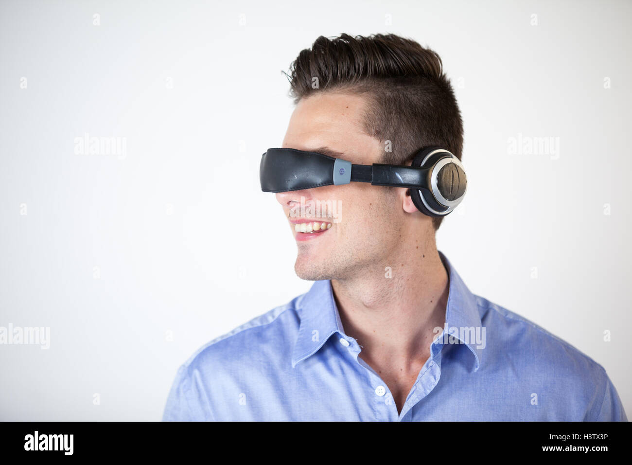 Man using virtual video glasses Stock Photo - Alamy
