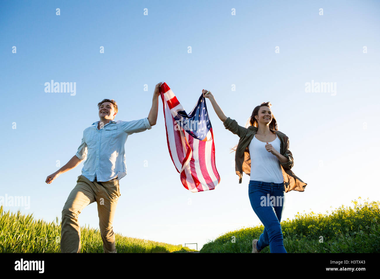 Running man flag hi-res stock photography and images - Alamy
