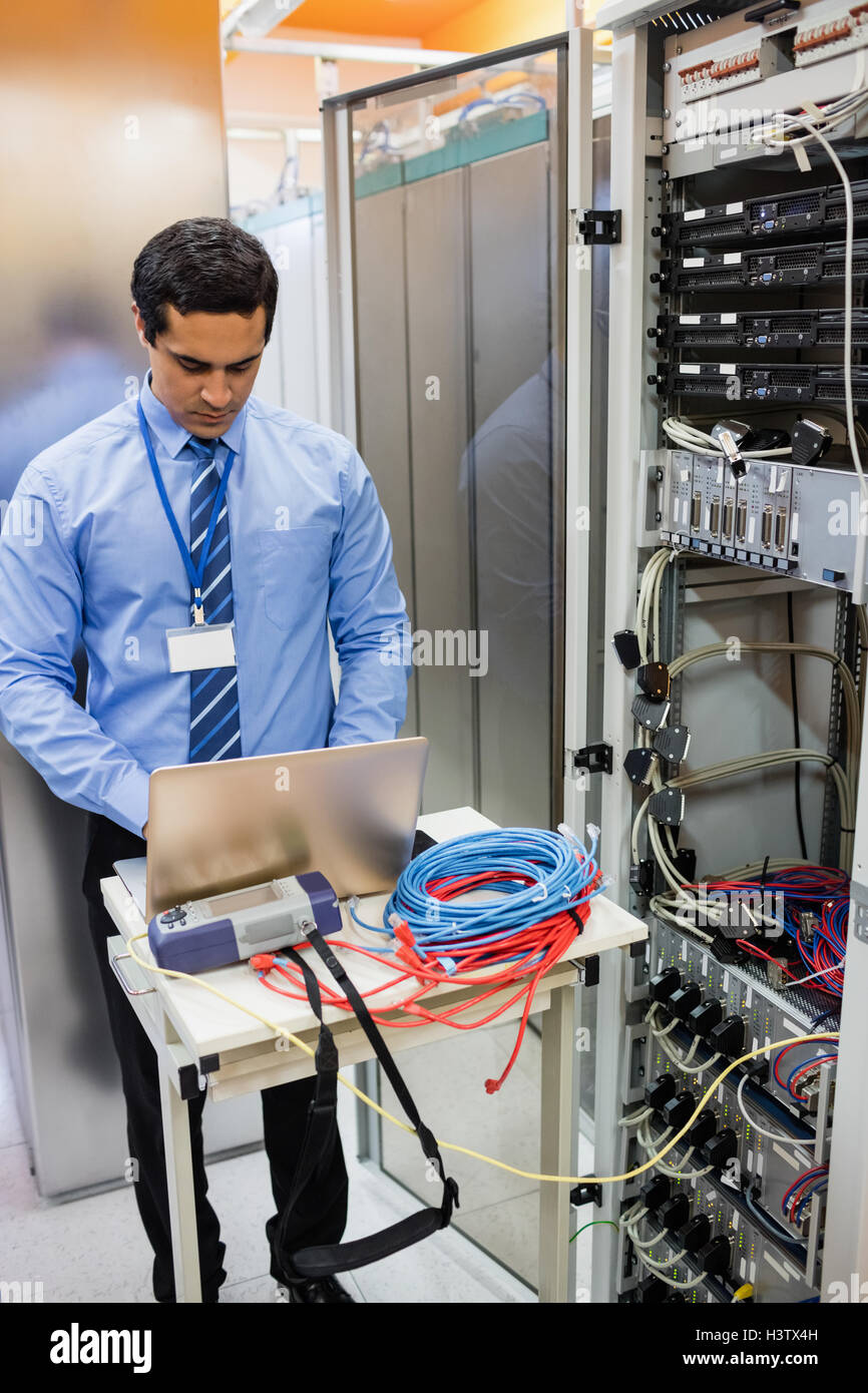 Data cabinet man testing hi-res stock photography and images - Alamy