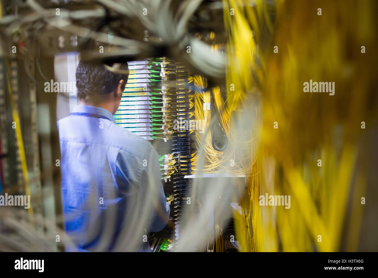 Technician checking routers Stock Photo - Alamy