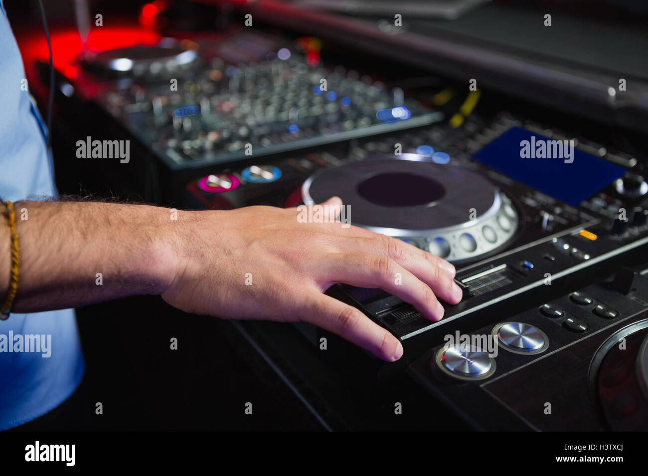 Male DJ playing music Stock Photo - Alamy