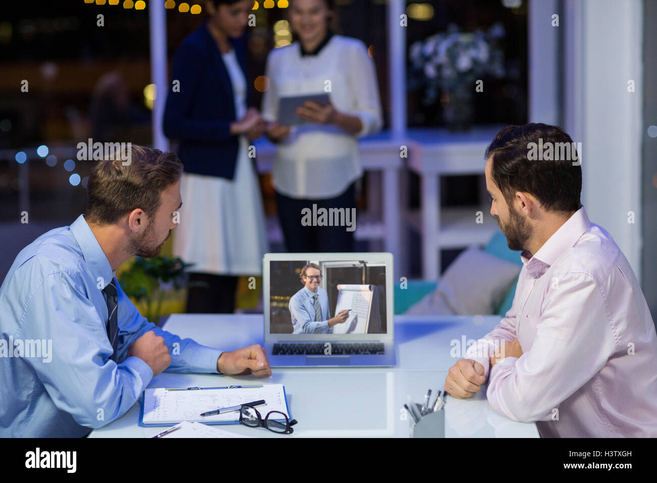 Businessmen having video conference Stock Photo - Alamy