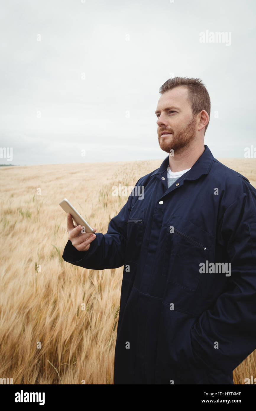 Farmer using mobile phone hi-res stock photography and images - Alamy
