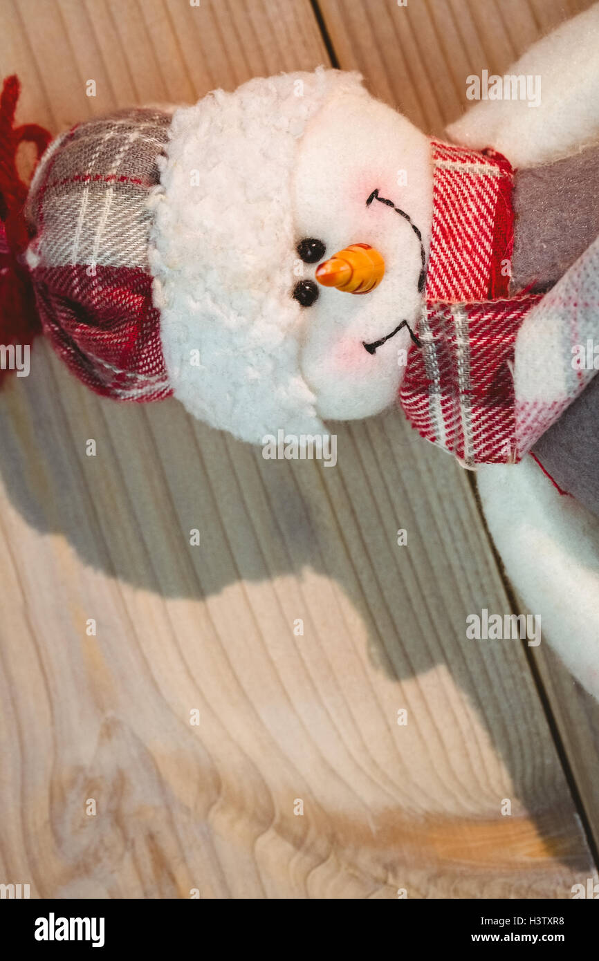 Close-up of snowman on wooden table Stock Photo - Alamy