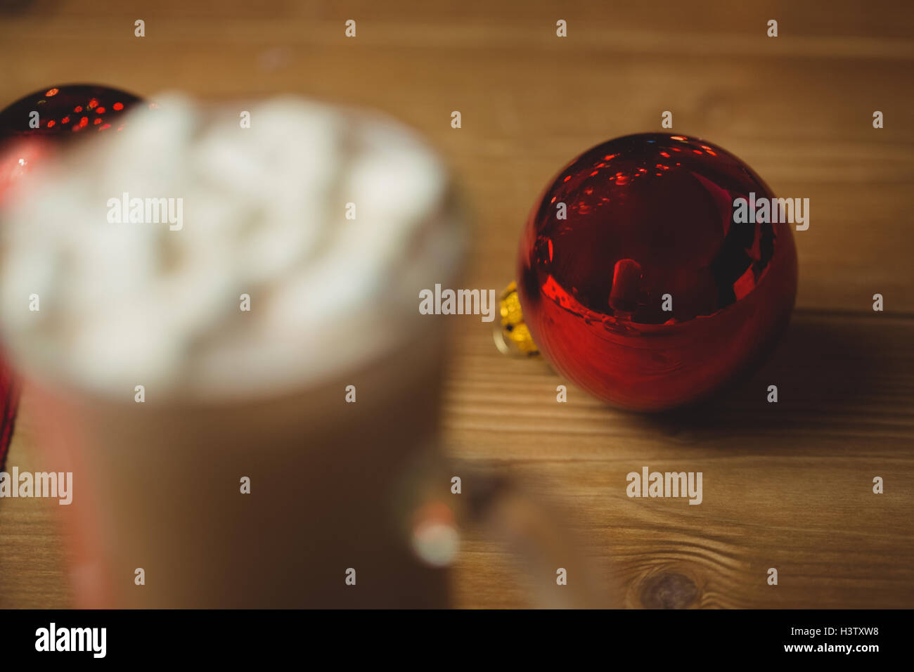 Cup of coffee with marshmallow and christmas bauble Stock Photo - Alamy