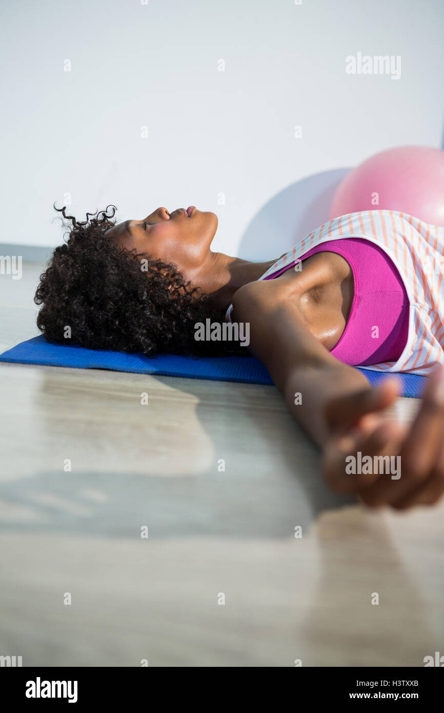 Woman in yoga corpse hi-res stock photography and images - Alamy