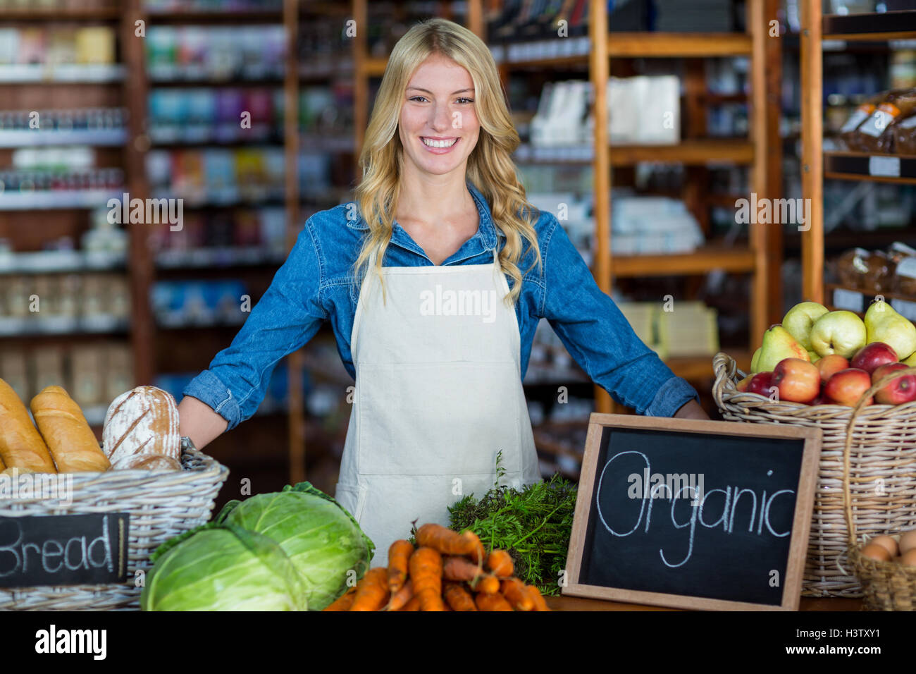 Smiling staff standing in hi-res stock photography and images - Alamy