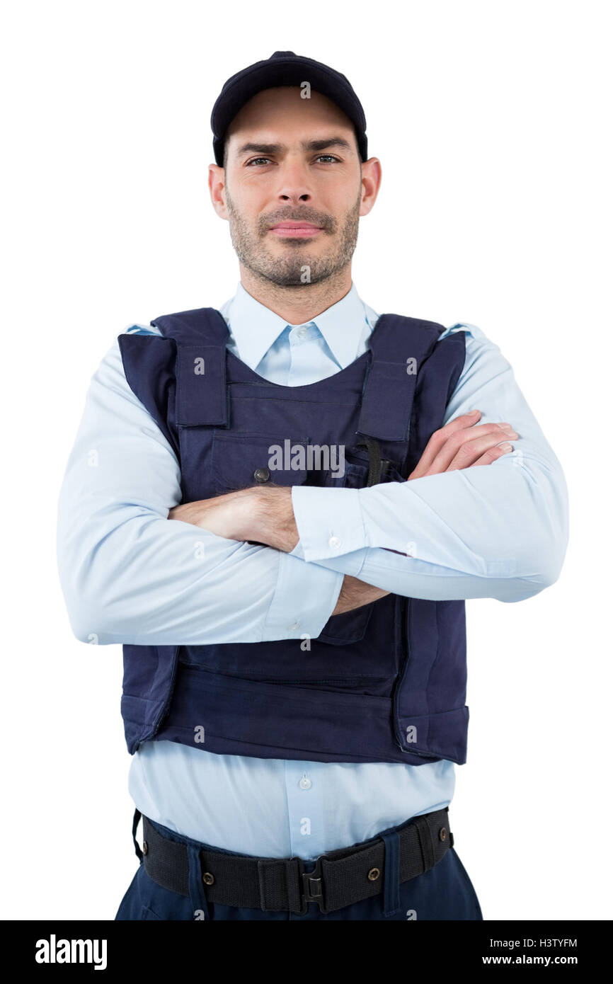 Security standing with arms crossed Stock Photo - Alamy